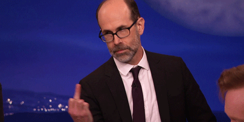 Brian Huskey Middle Finger GIF by Team Coco - Find & Share on GIPHY