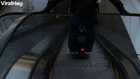 Falling Down Escalator Gif