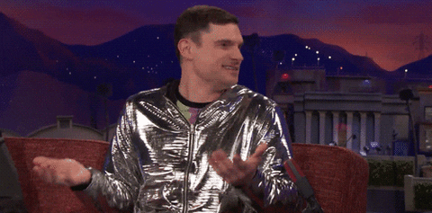 Flula Borg Shrug GIF by Team Coco - Find & Share on GIPHY