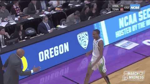 High Five College Basketball GIF by NCAA March Madness - Find & Share ...
