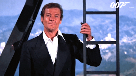 Roger Moore Smile GIF by James Bond 007 - Find & Share on GIPHY