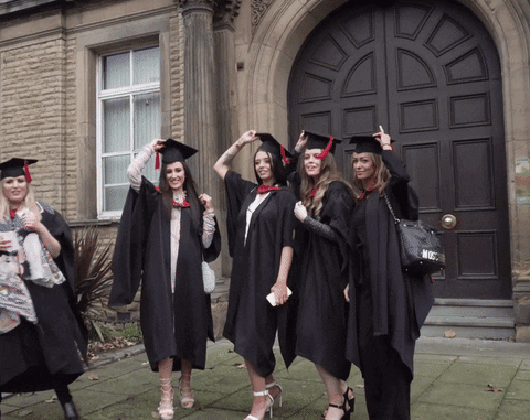 College Graduation Hats In The Air
