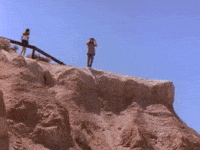 Girl Falling Off Cliff Gif