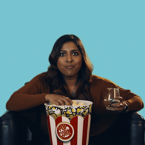 Eating Popcorn Laughing Gif