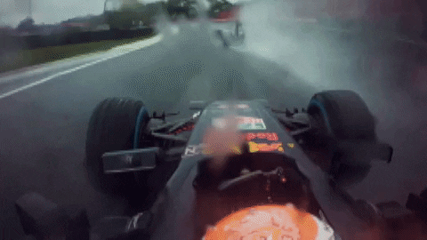 Formula One Cars In The Rain